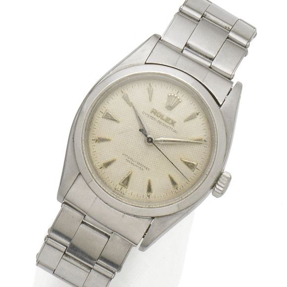 Bonhams : Rolex. A stainless steel automatic calendar bracelet watch ...
