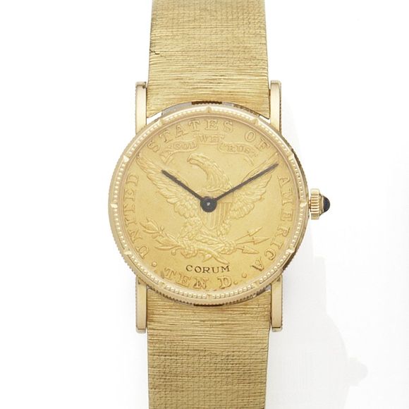 Bonhams : Corum. An 18K gold manual wind bracelet watch with coin dial ...