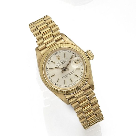 Bonhams : Rolex. An 18K gold automatic calendar bracelet watch Datejust ...