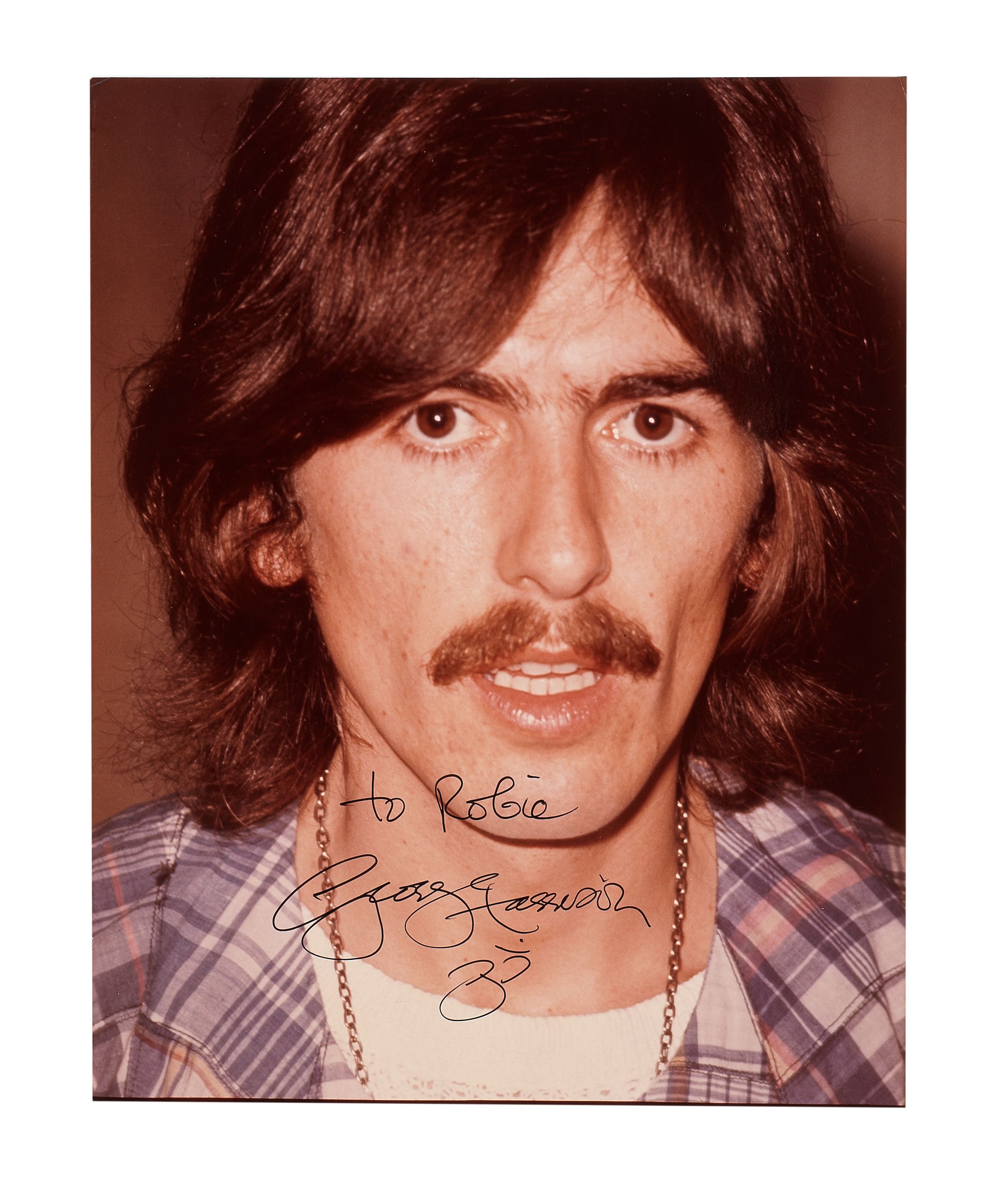 Bonhams : George Harrison A signed photograph, late 1980's,