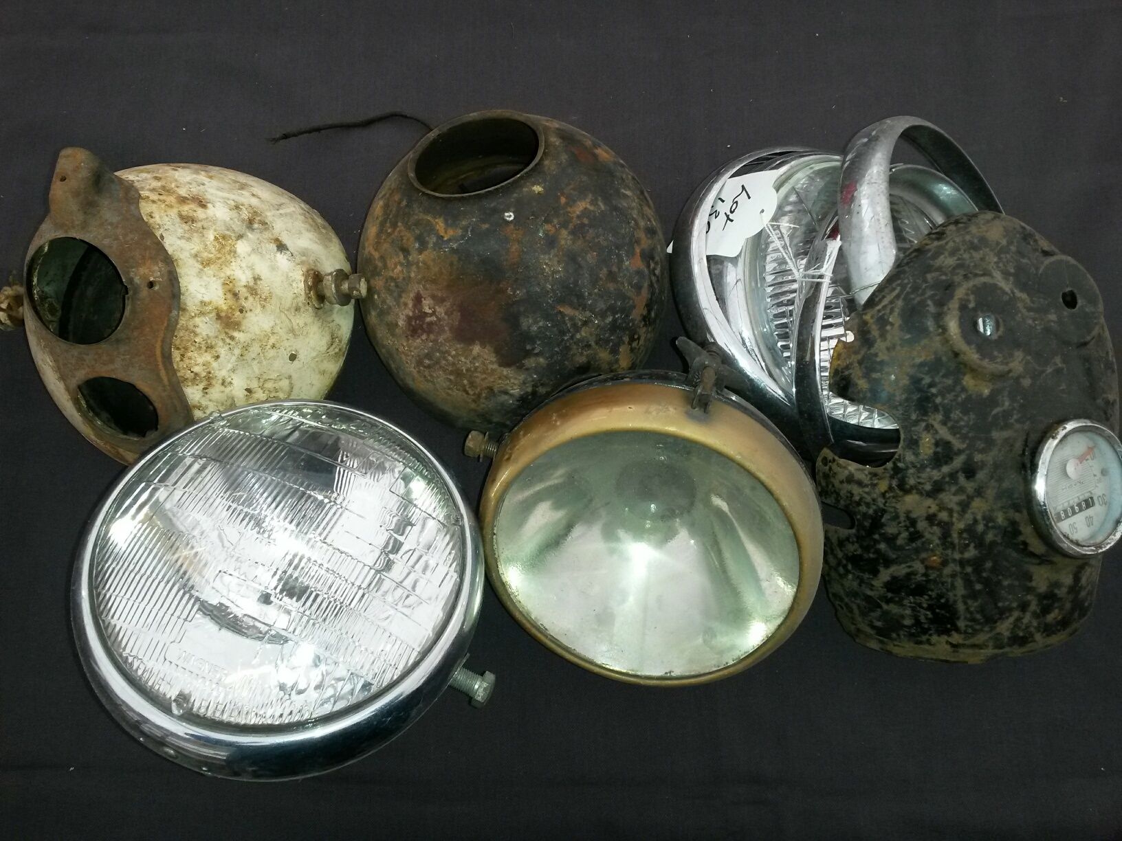 Bonhams Cars : A selection of headlamp units and rims, ((Qty))