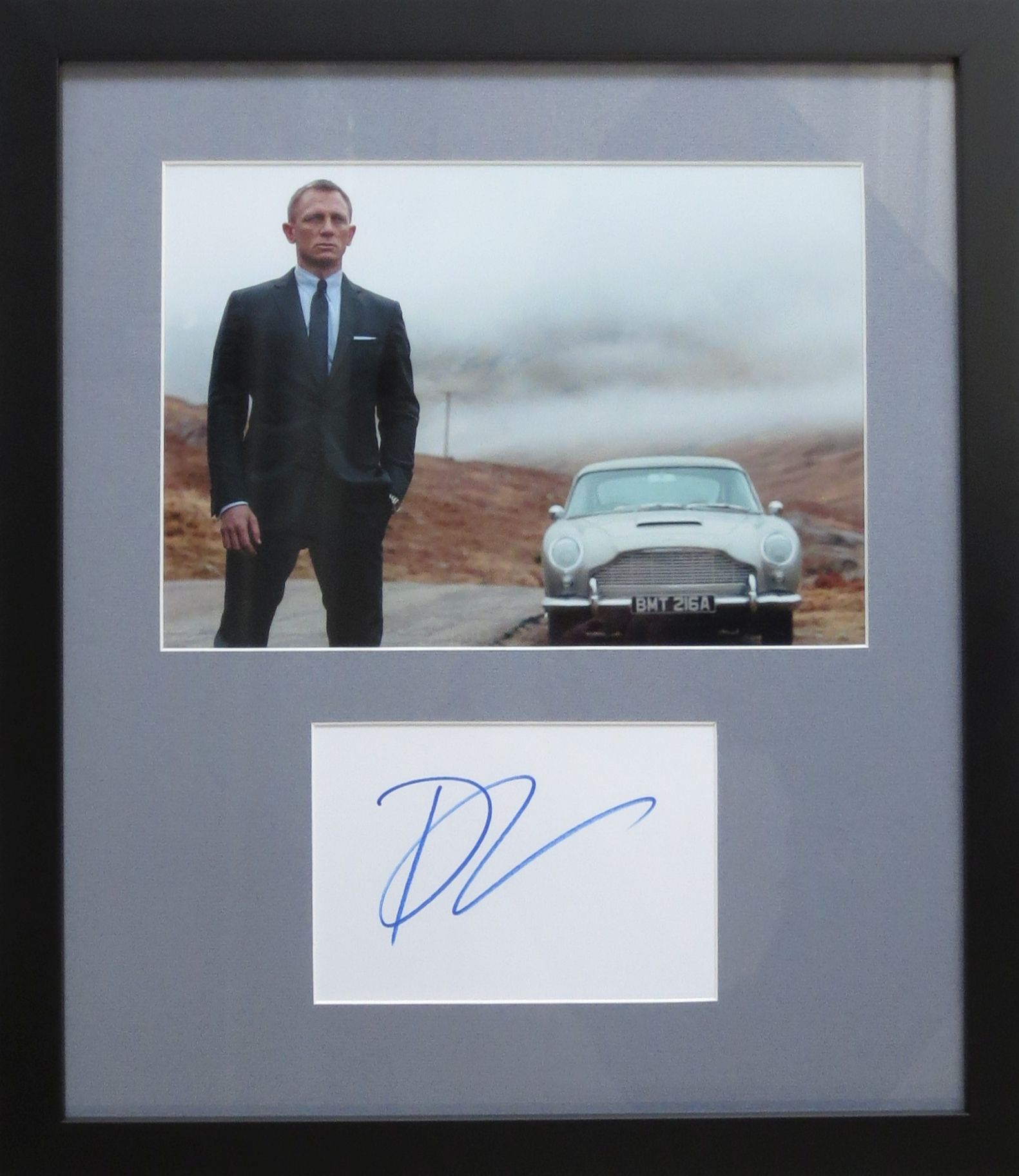 Bonhams Cars : A photograph with signature of Daniel Craig with the ...
