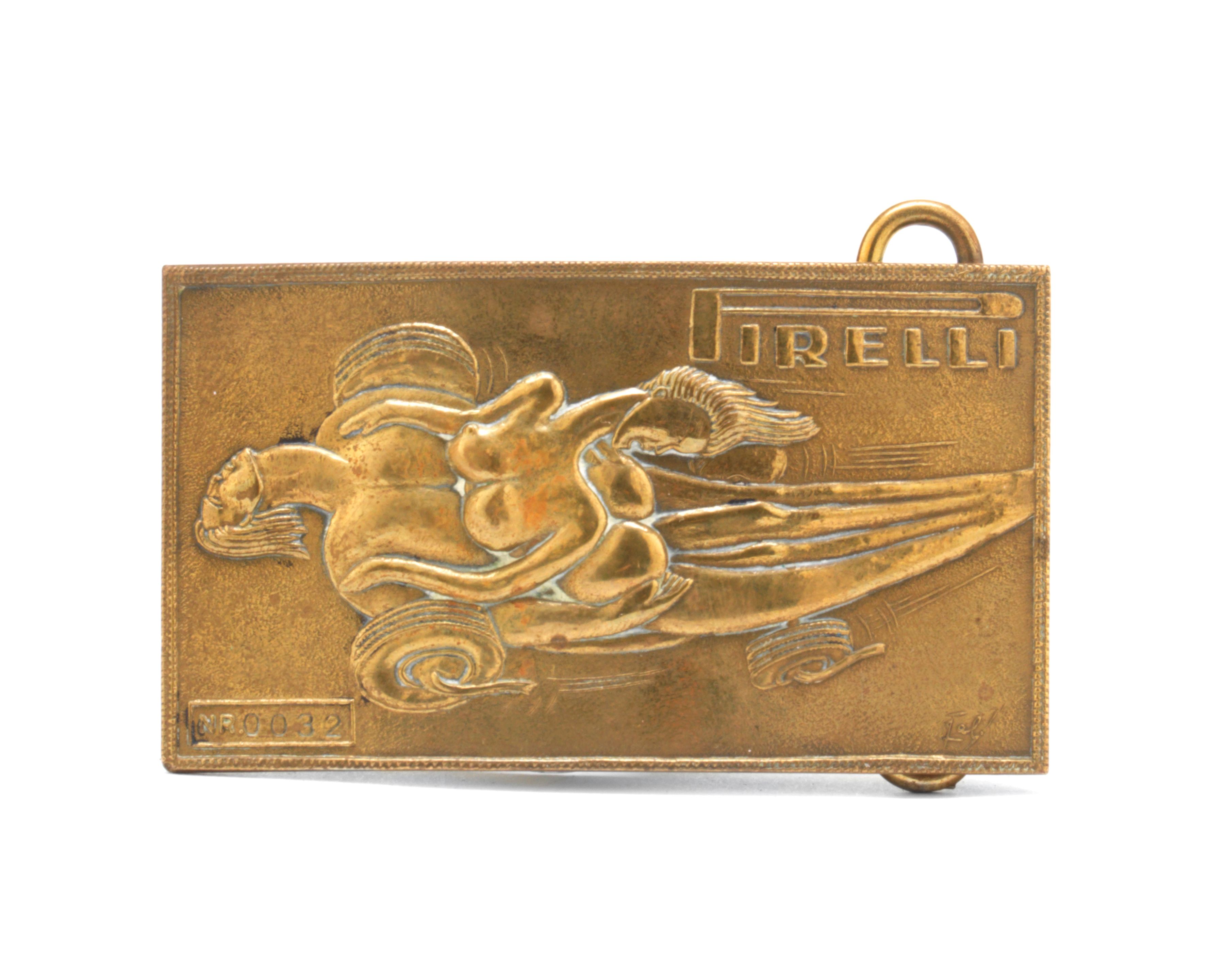 Bonhams Cars : A rare Pirelli belt buckle designed by Salvador Dali ...