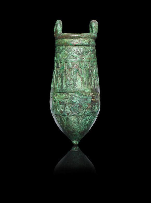 Bonhams : An Egyptian bronze situla