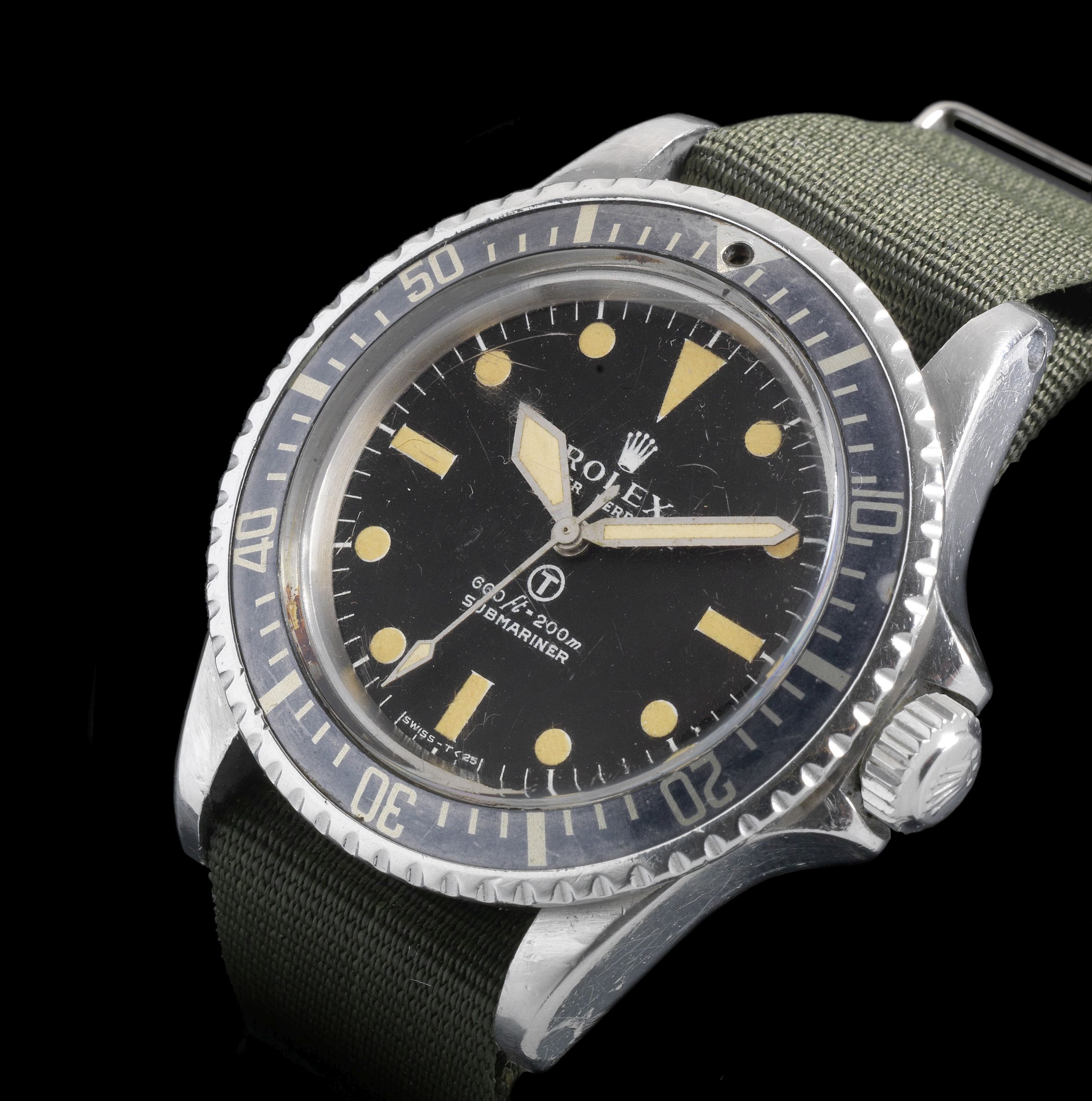 Bonhams : Rolex. A rare stainless steel tonneau automatic military ...