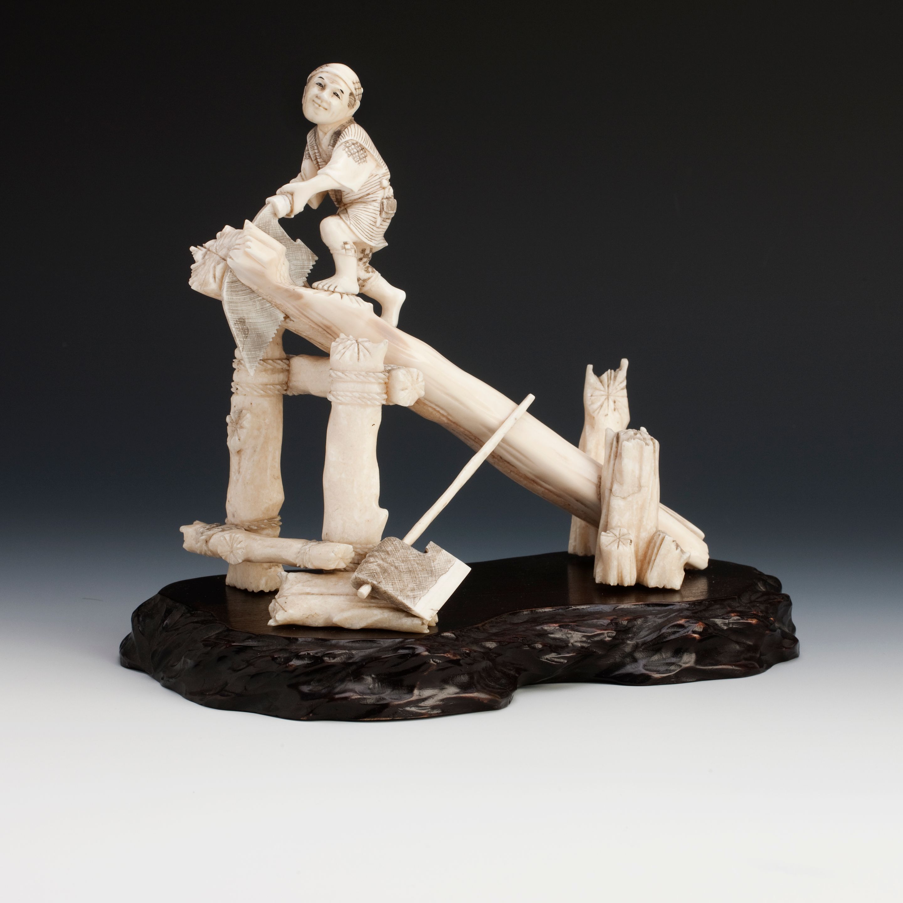 Bonhams : An ivory and marine ivory okimono of a woodsman By Shin Shu ...