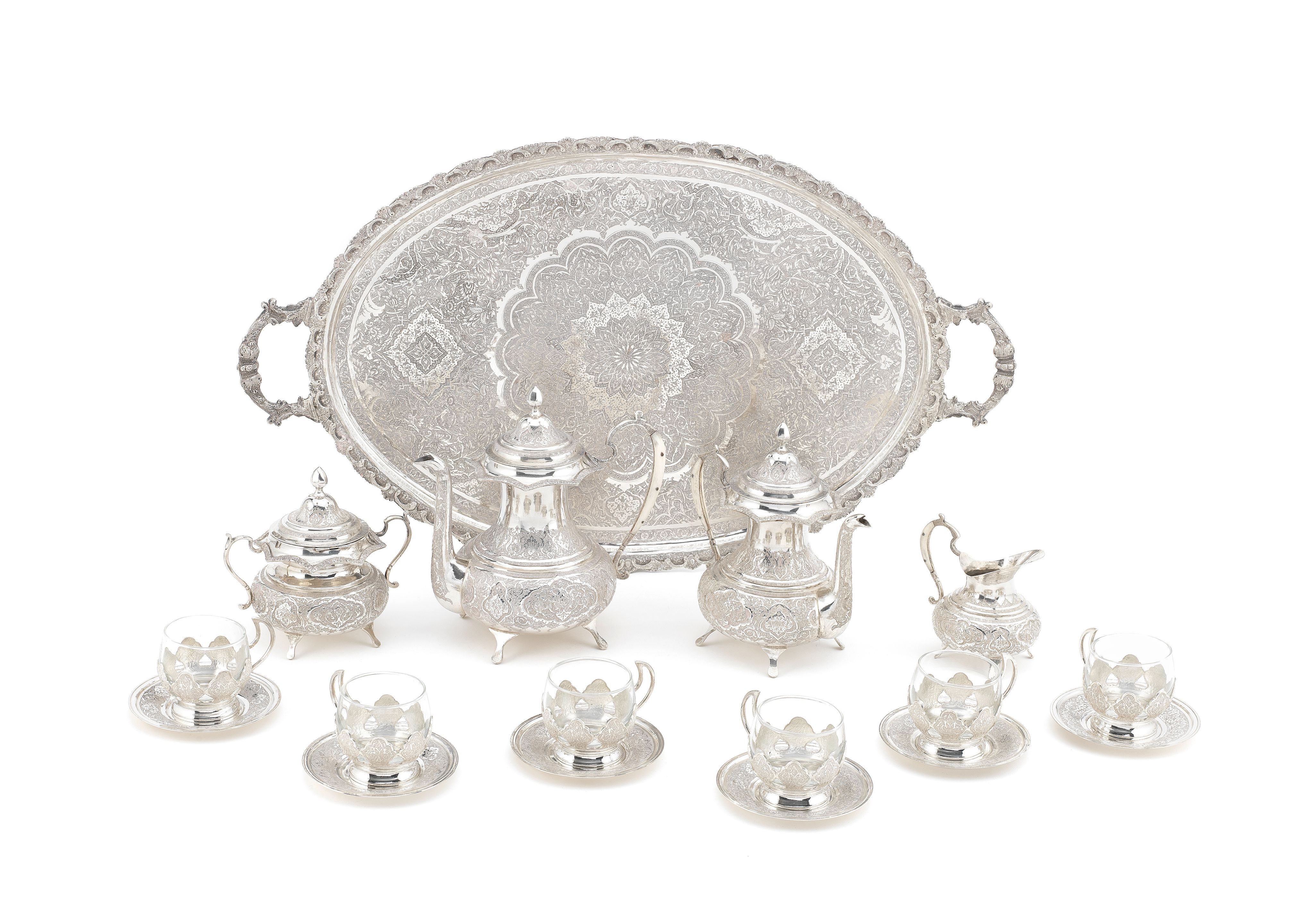 Bonhams : An Iranian metalware tray, tea and coffee service with cups ...