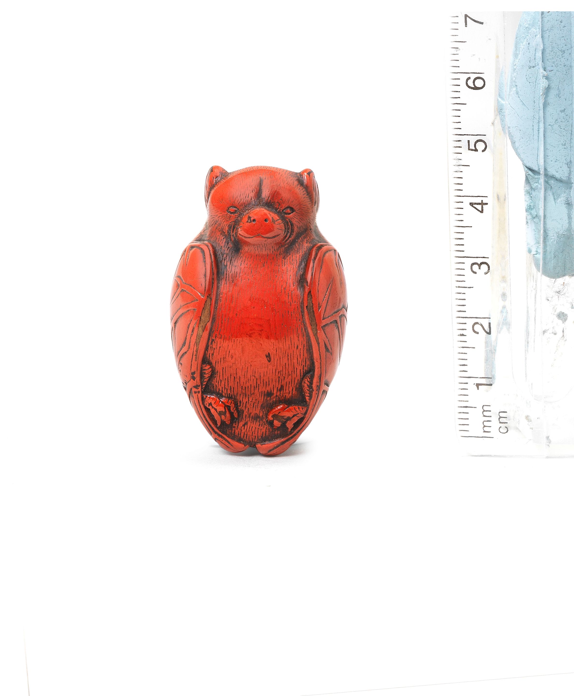 Bonhams : A red-lacquer netsuke of a bat 19th century