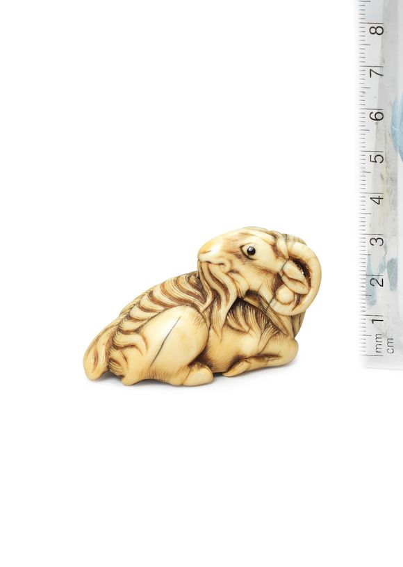 Bonhams : An ivory netsuke of a goat Kyoto, late 18th century