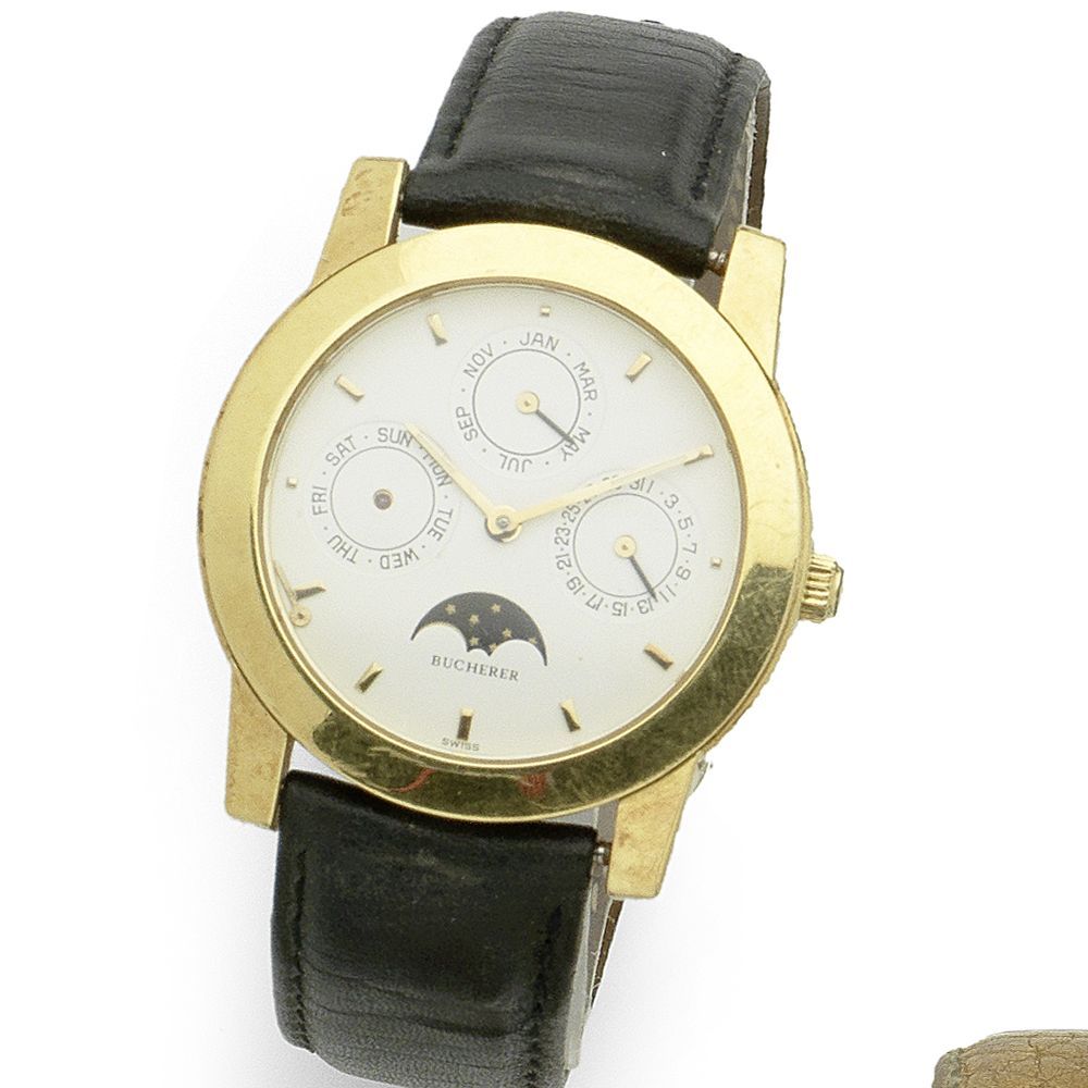 Bonhams : Bucherer. An 18K gold automatic triple calendar wristwatch ...