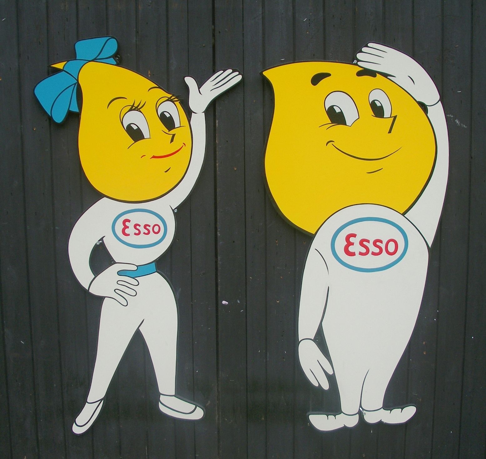Bonhams Cars : Three hand-painted Esso Mr & Mrs Drip wooden cut-out ...