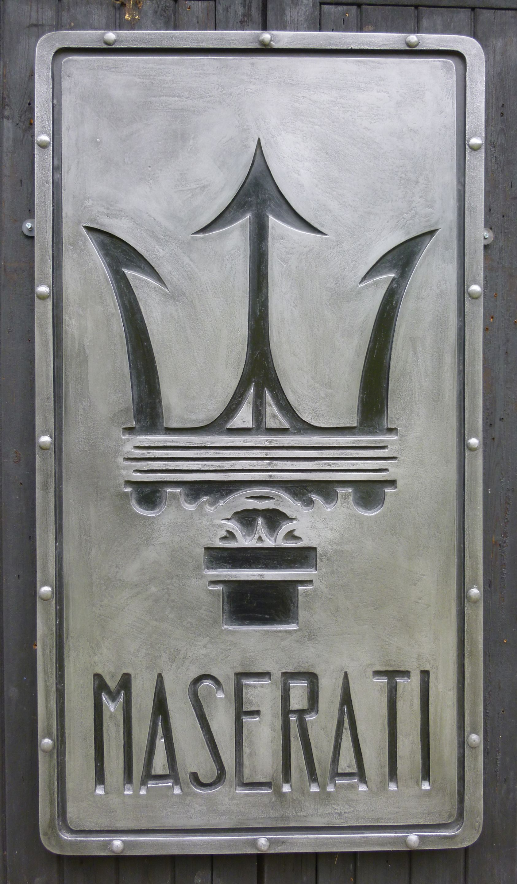 Bonhams Cars : A 'Maserati' garage display emblem,