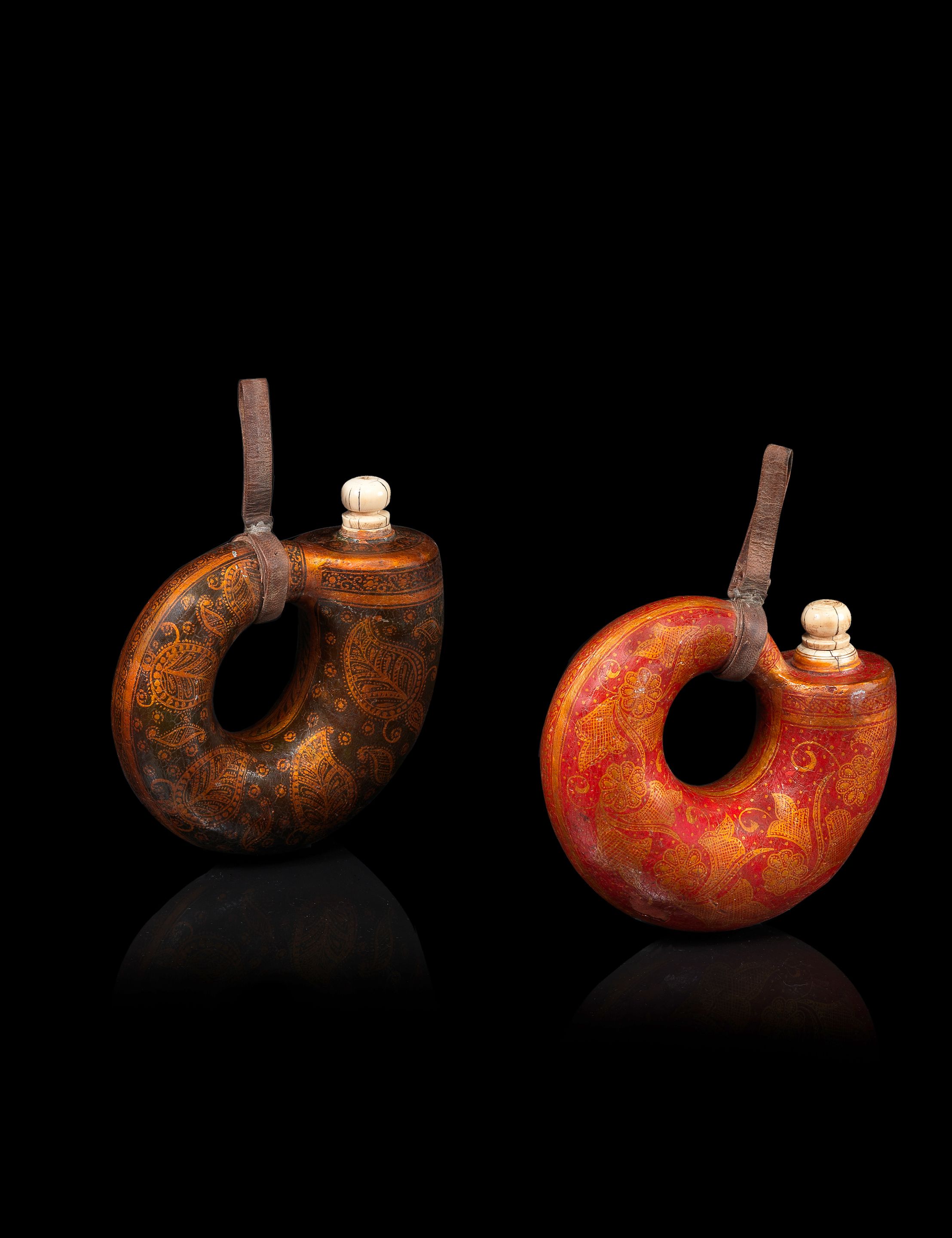 Bonhams : Two painted lacquer wood Powder Horns India, 19th Century(2)