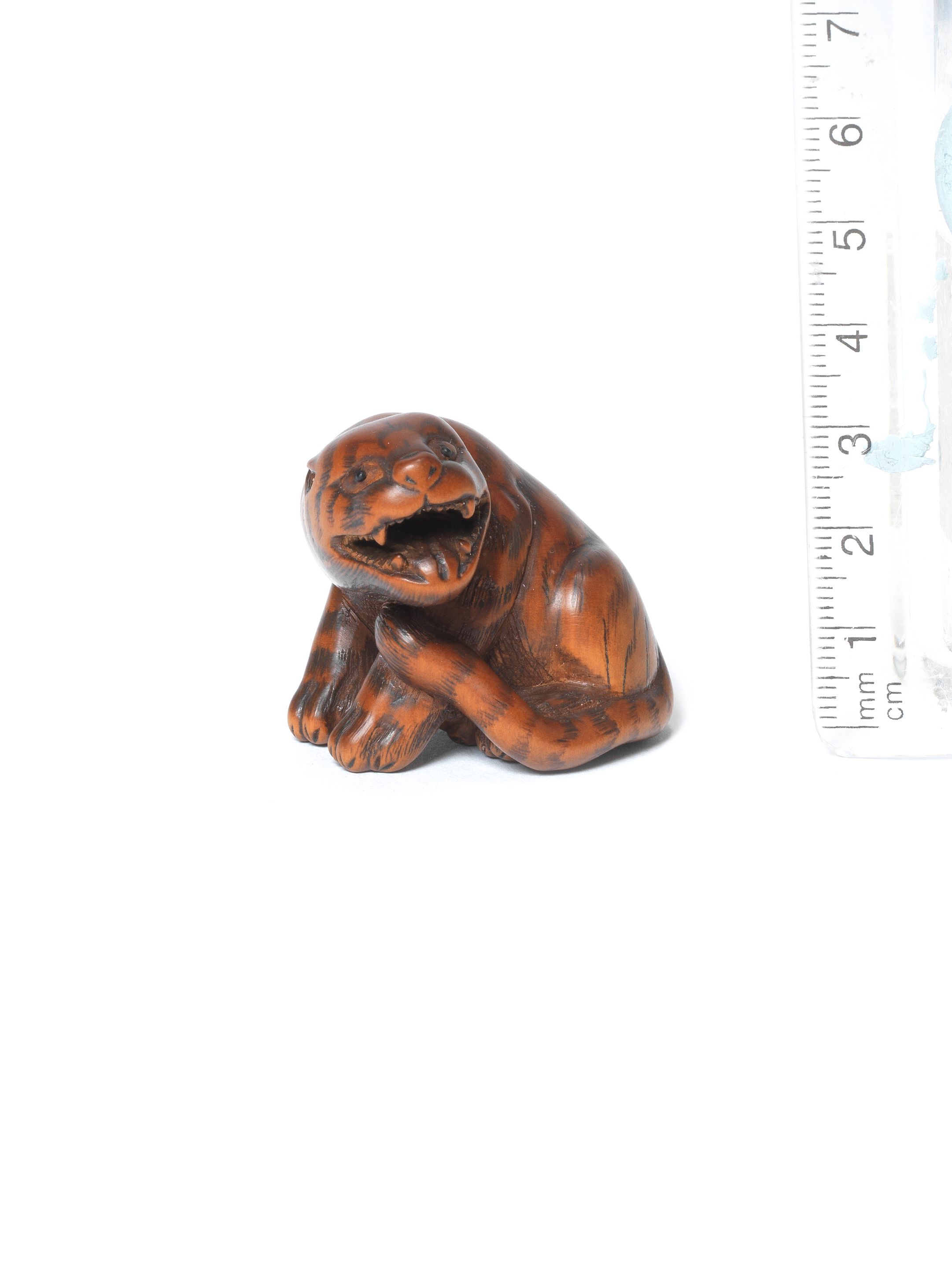 Bonhams : A wood netsuke of a tiger By Masanao, Yamada, Ise province ...