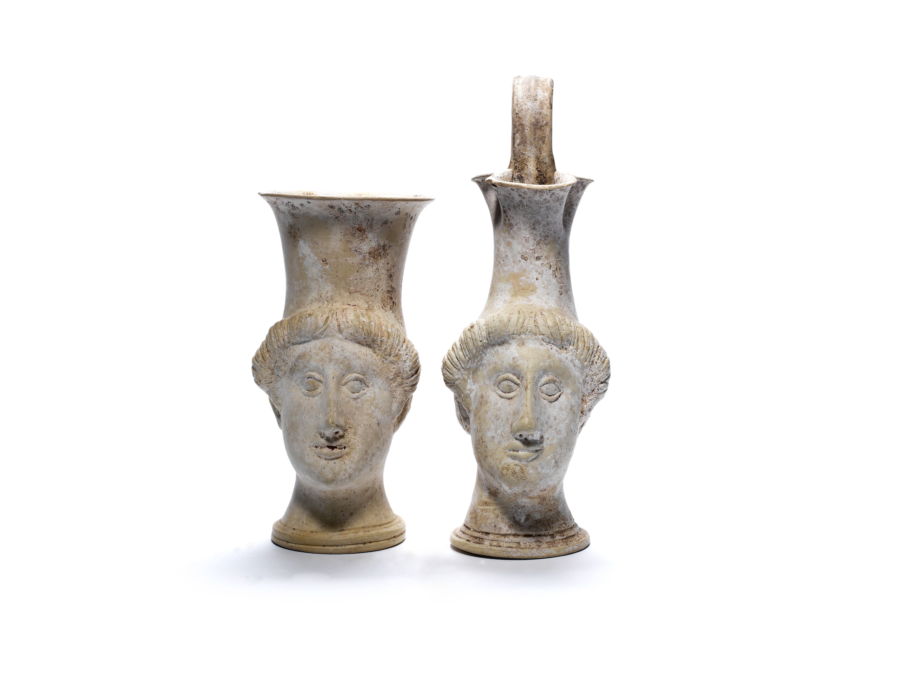 Bonhams : Two Greek pottery head flasks 2