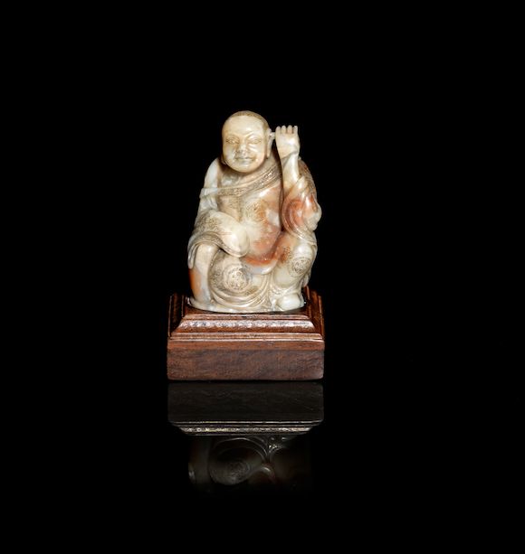 Bonhams : A soapstone figure of Nagasena, the ear-picking arhat Qing ...