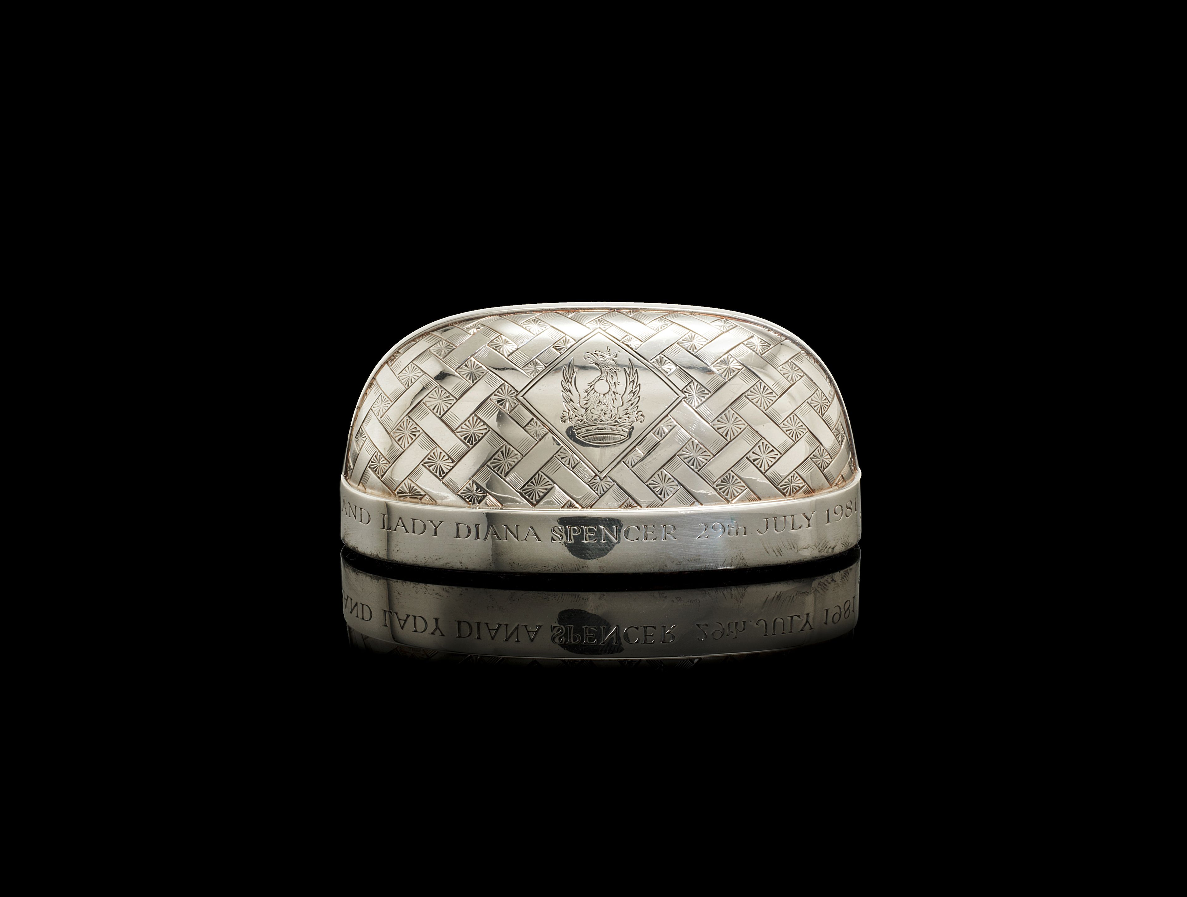 Bonhams : GERALD BENNEY A silver commemorative paper weight to ...