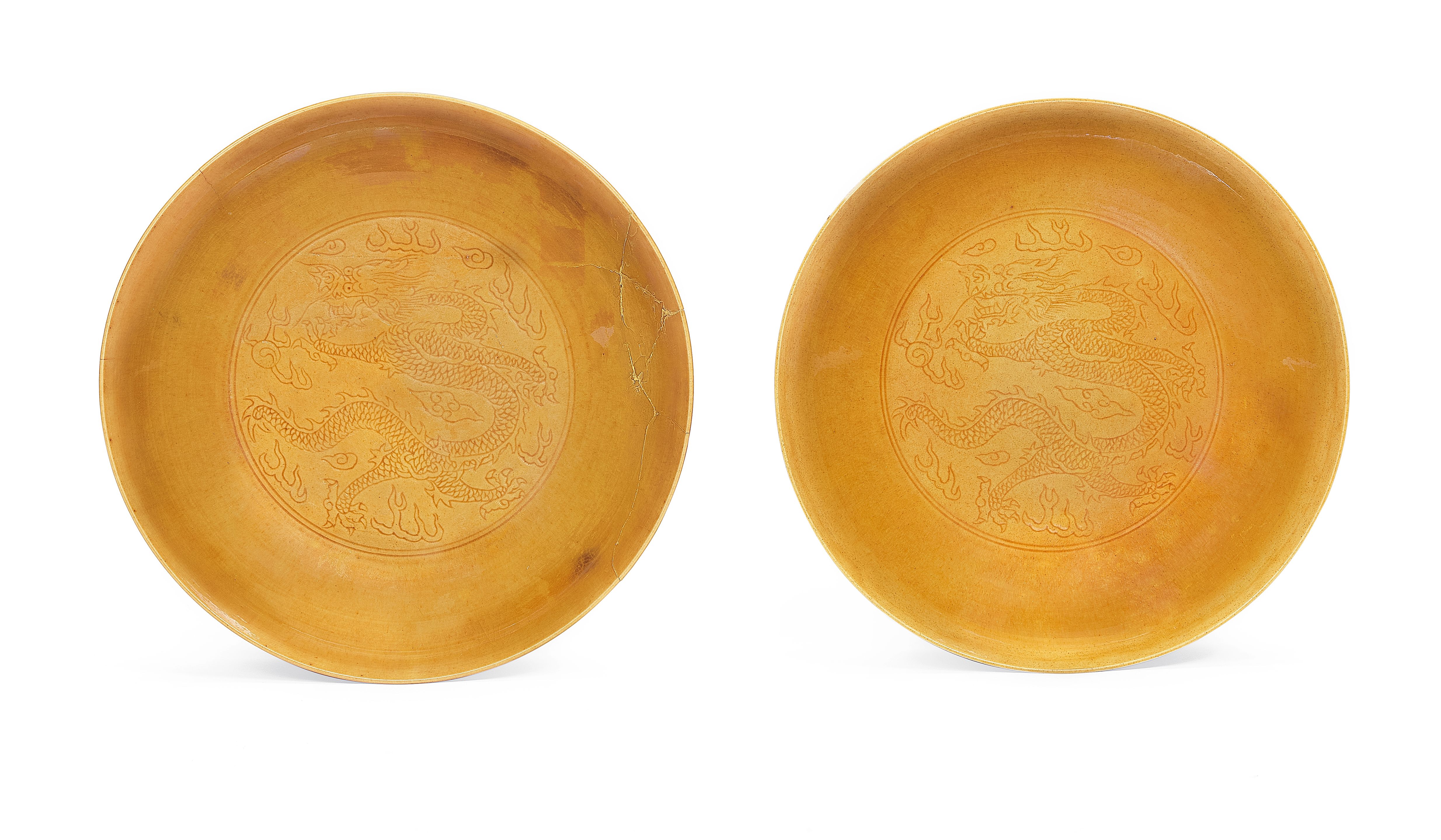 Bonhams : A pair of yellow glazed anhua 'dragon' dishes Kangxi six ...