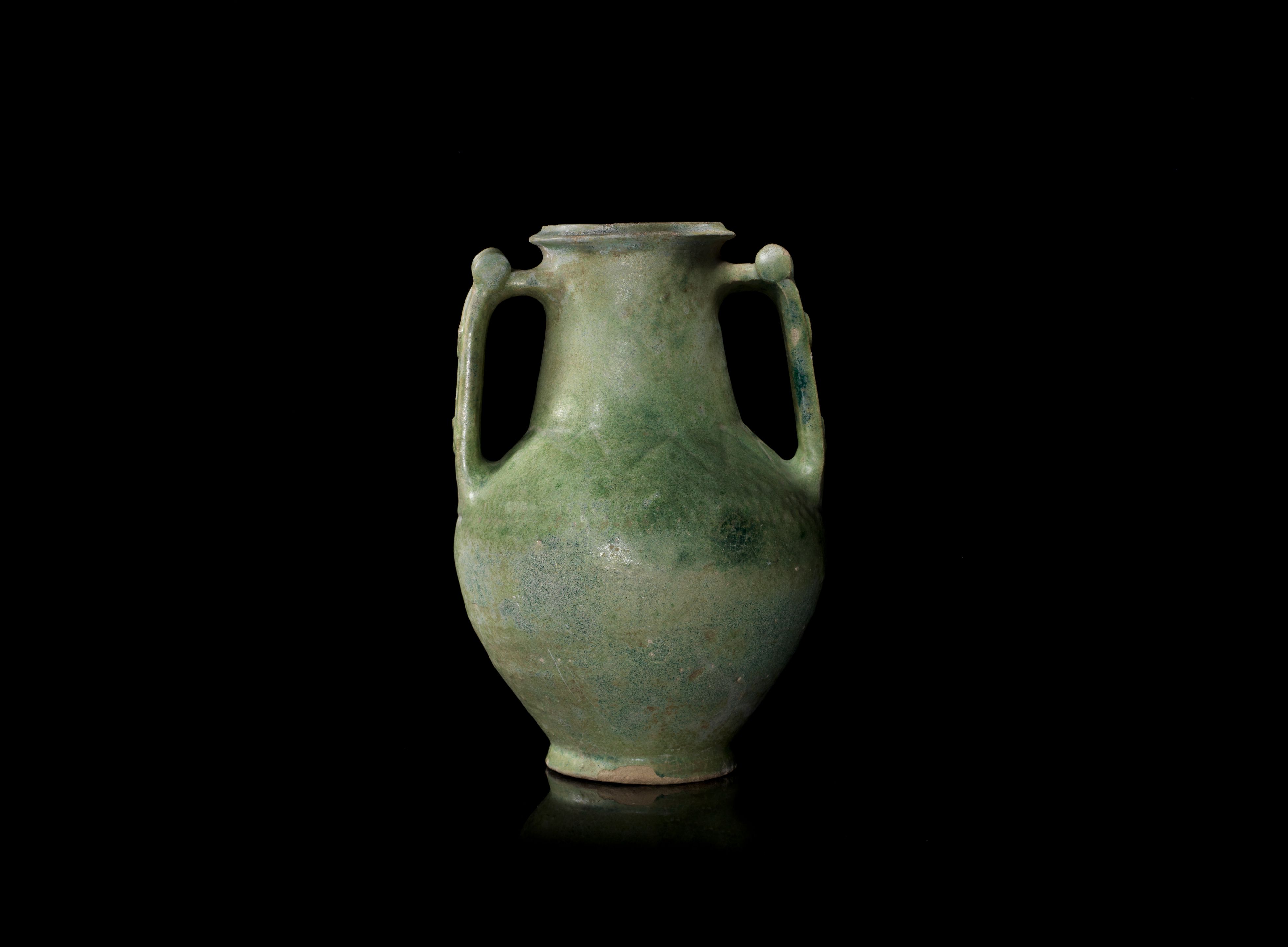 Bonhams : A Sasanian green glazed pottery amphora