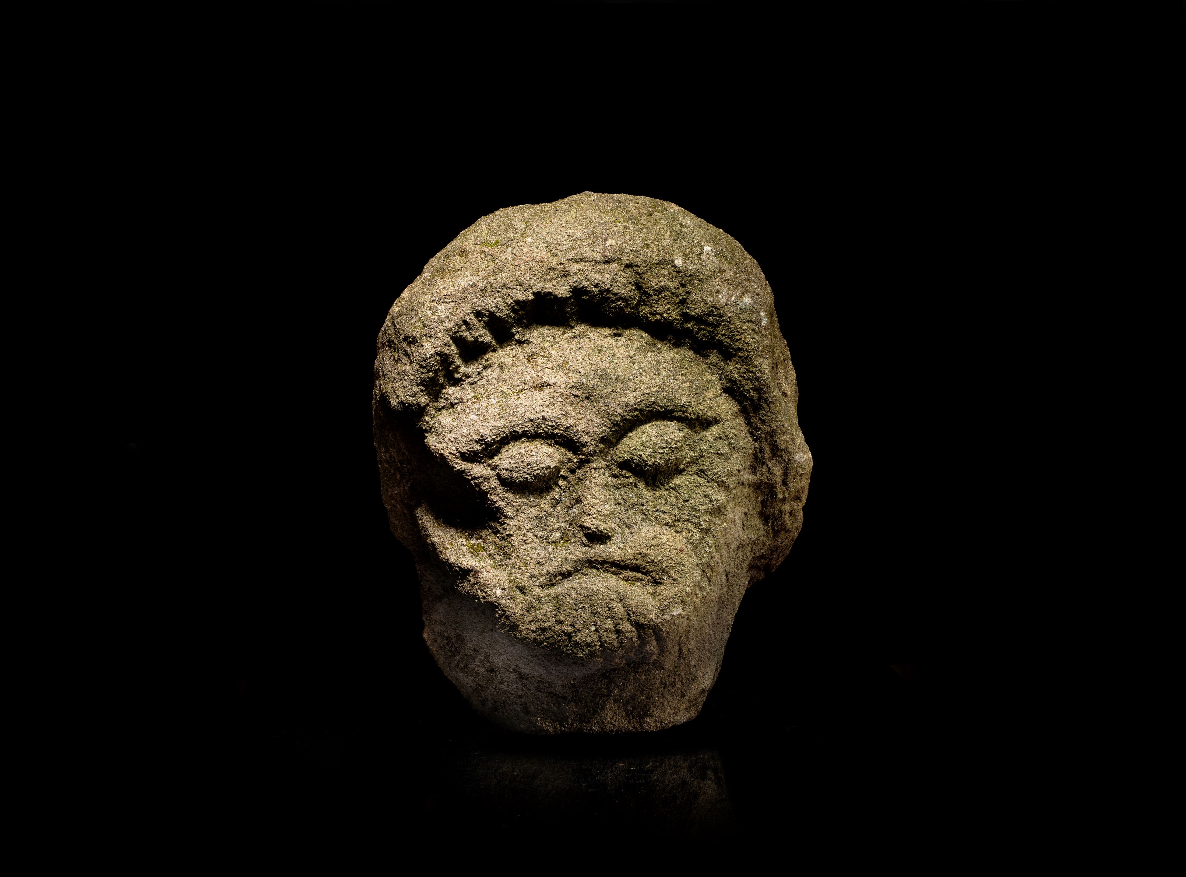 Bonhams : A Celtic stone head of a man