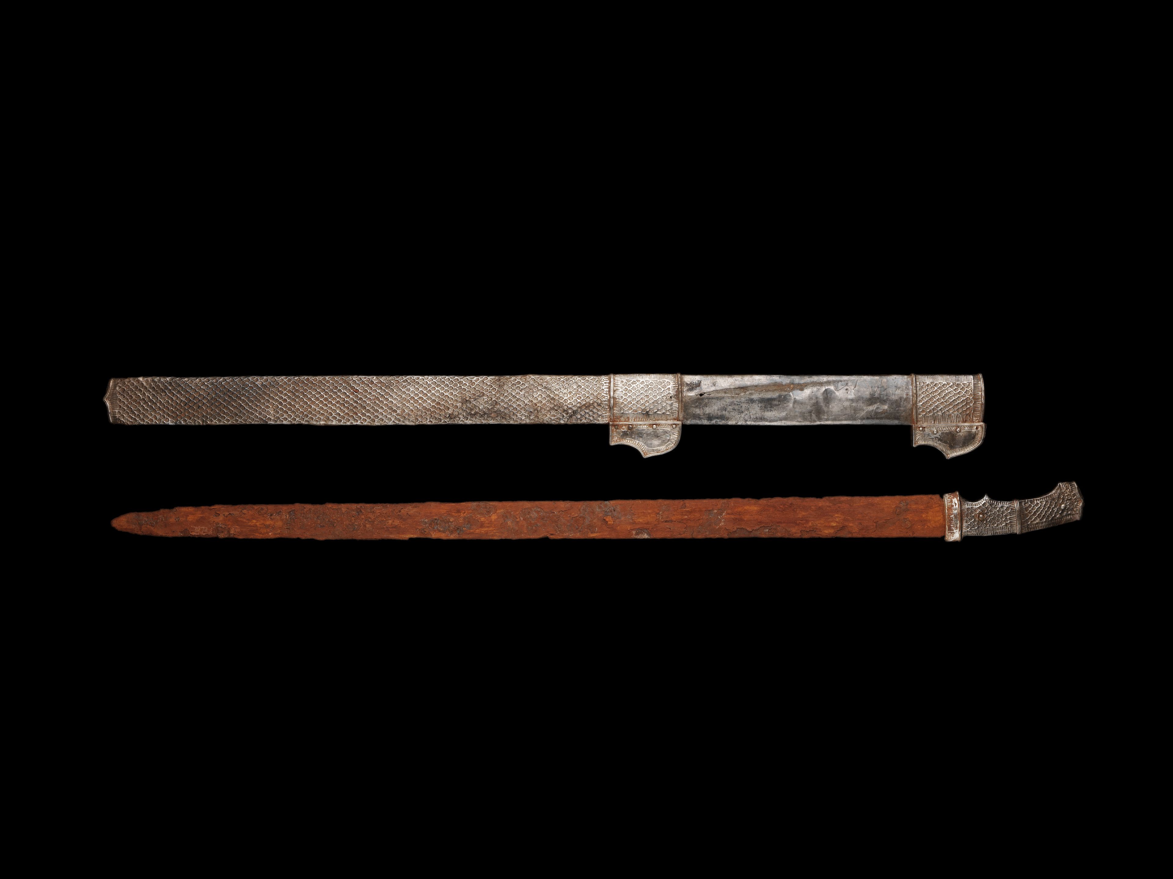 Bonhams : A Sasanian iron and silver sword with scabbard