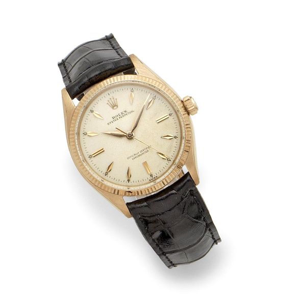 Bonhams : Rolex. An 18K gold automatic wristwatch Oyster Perpetual, Ref ...