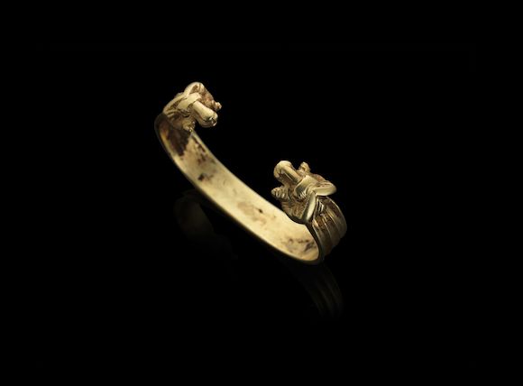 Bonhams : A Persian electrum ram head bracelet