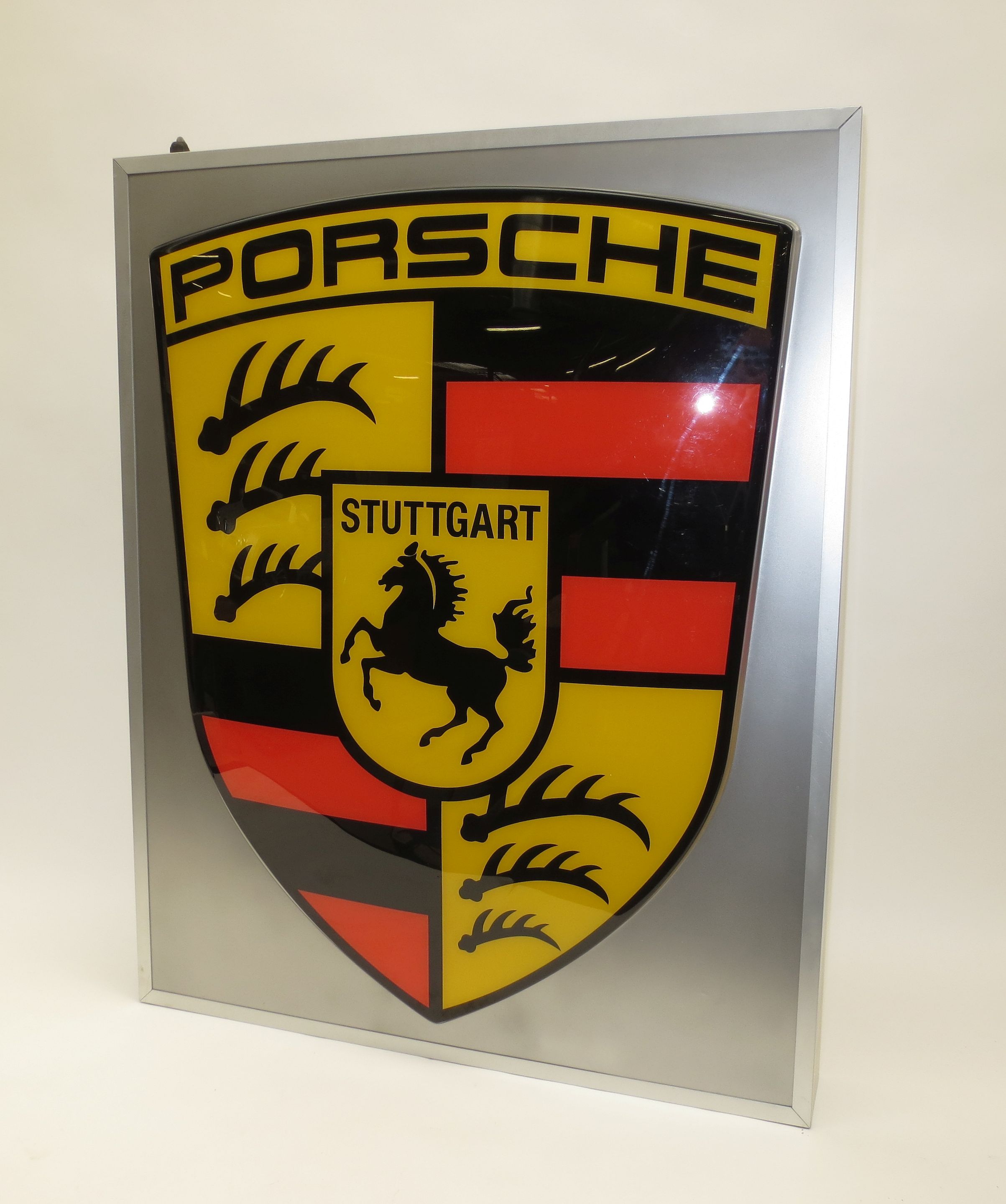 Bonhams Cars : A 'Porsche' illuminating sign,