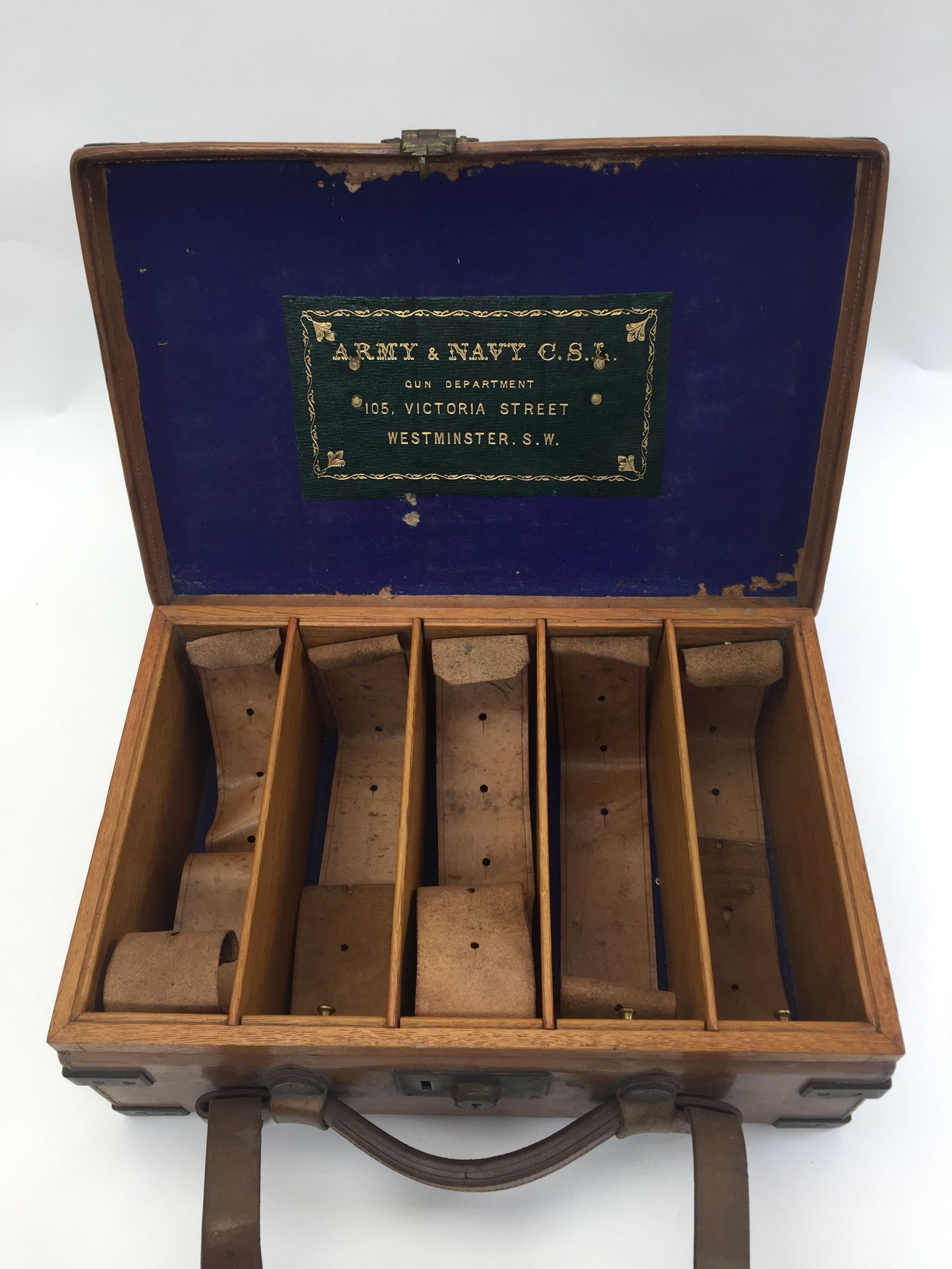 Bonhams : A brass-mounted oak and leather cartridge-magazine