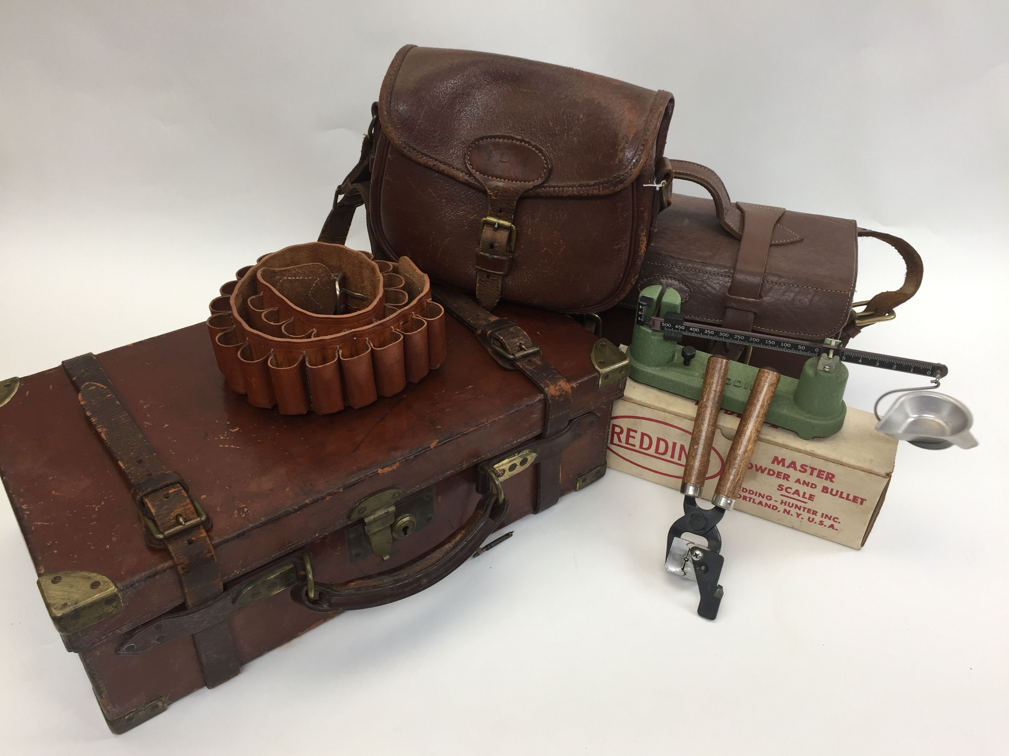 Bonhams : A Brass-Mounted Oak And Leather Cartridge-Magazine