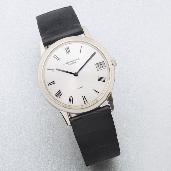Bonhams : Patek Philippe. An 18K white gold automatic calendar ...