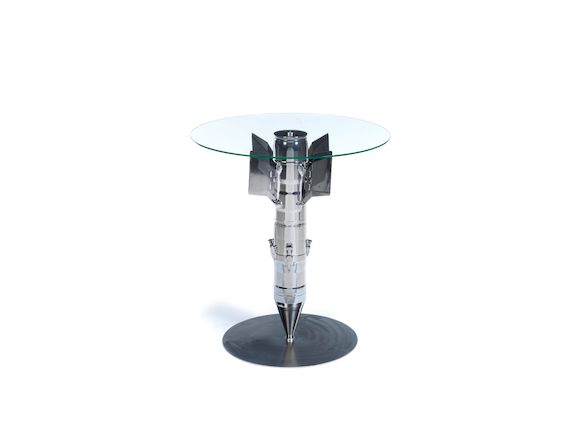 Bonhams : A decorative polished silvered metal Soviet rocket casing table