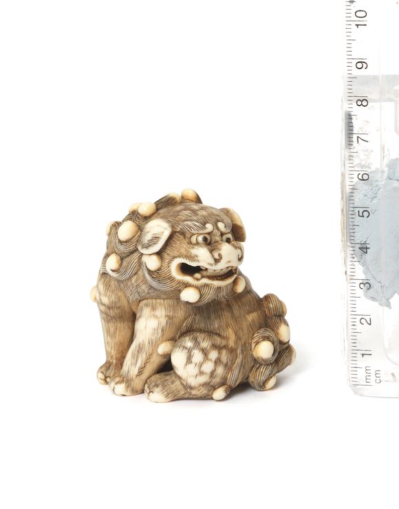 Bonhams : A large ivory netsuke of a shishi School of Tomotada, Kyoto ...