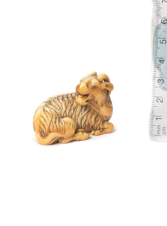 Bonhams : An ivory netsuke of a recumbent goat By Okatomo, Kyoto, Edo ...