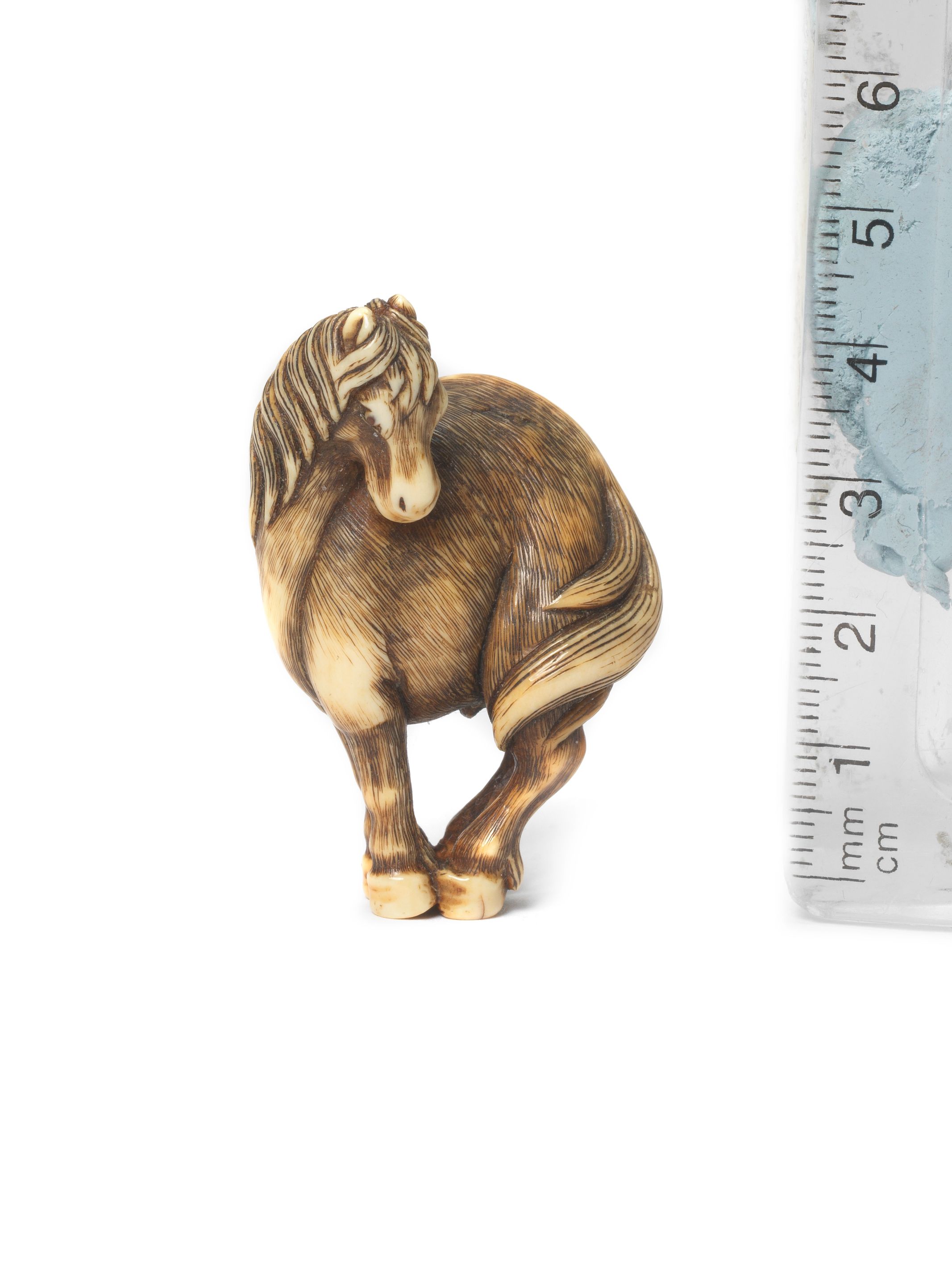 Bonhams : An ivory netsuke of a horse By Tomotada, Kyoto, 18th century