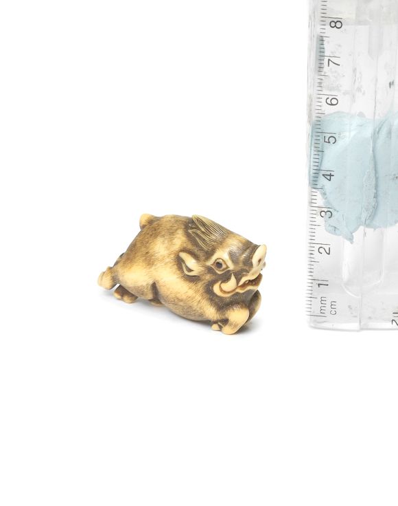 Bonhams : An ivory netsuke of a galloping boar Kyoto, early 19th century