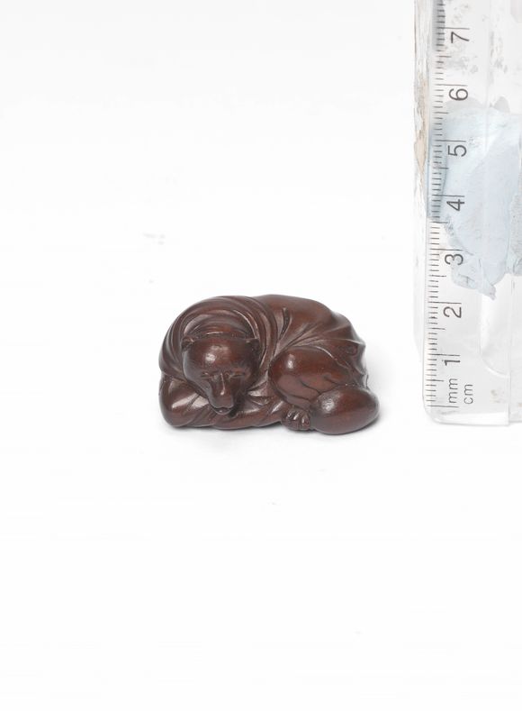 Bonhams : A wood netsuke of a tanuki (badger) in human attire By Ono ...