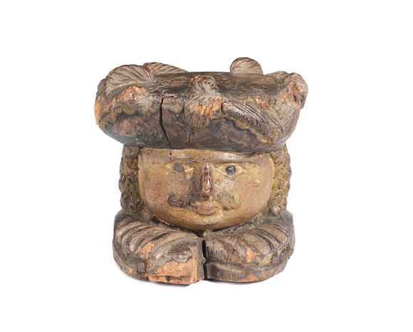 Bonhams : An unusual polychrome-decorated carved elm mount or finial ...
