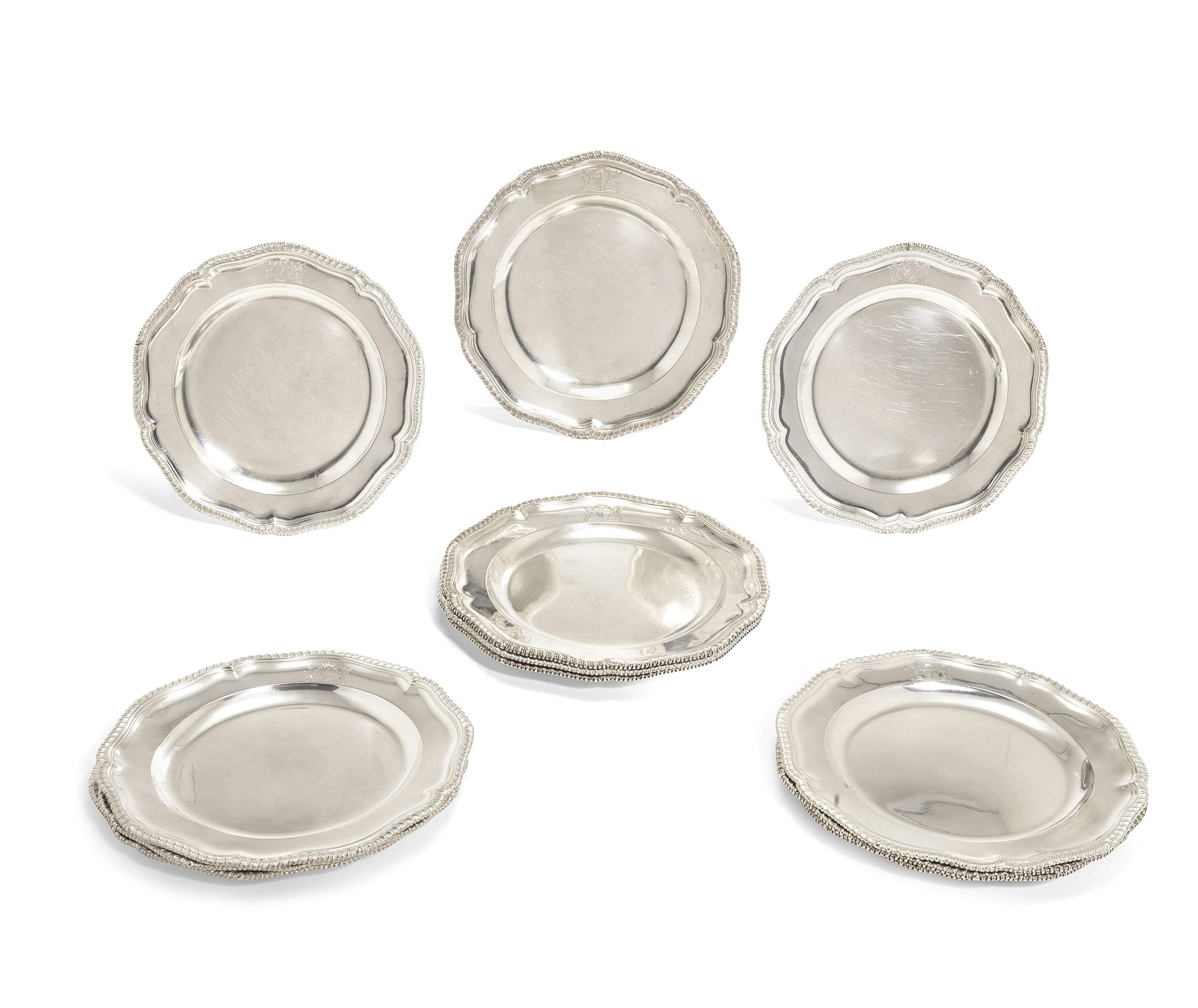 Bonhams : A matched set of twelve George III silver plates eleven by ...