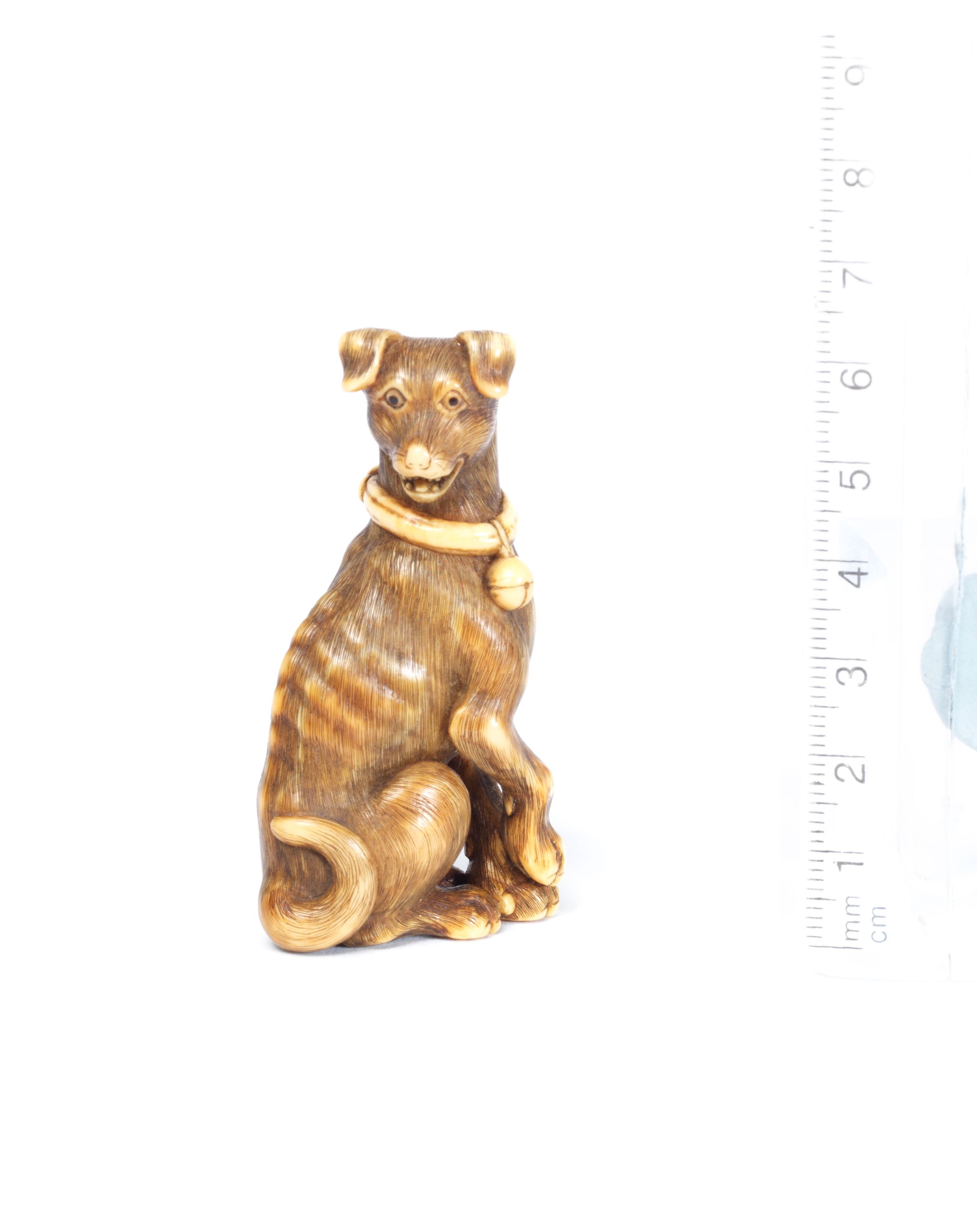 Bonhams : An ivory netsuke of a dog Style of Okatomo, Kyoto, early 19th ...