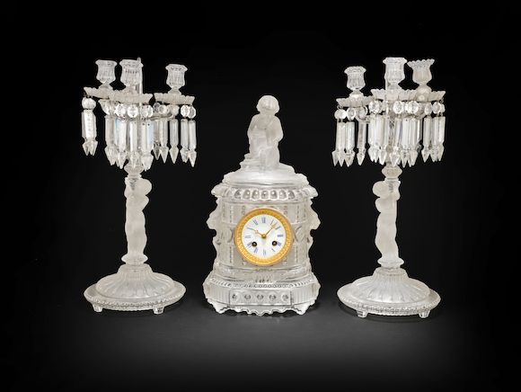 Bonhams : A Baccarat moulded and frosted glass clock garniture, circa 1880