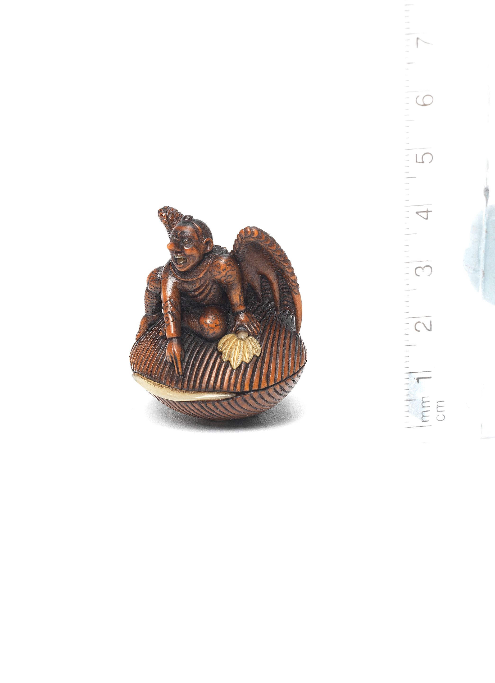 Bonhams : A wood netsuke of a tengu By Tamekazu, 19th century