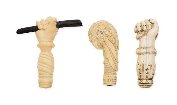 Bonhams : Three carved whale's teeth cane handles, Mid-19th century ...