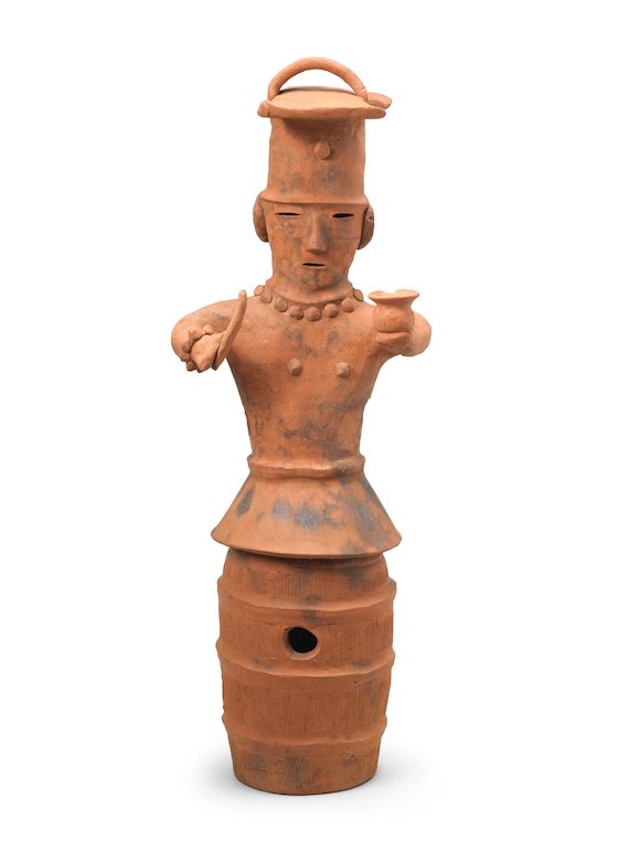 Bonhams : A HANIWA STANDING EARTHENWARE FEMALE FIGURE, PROBABLY A ...