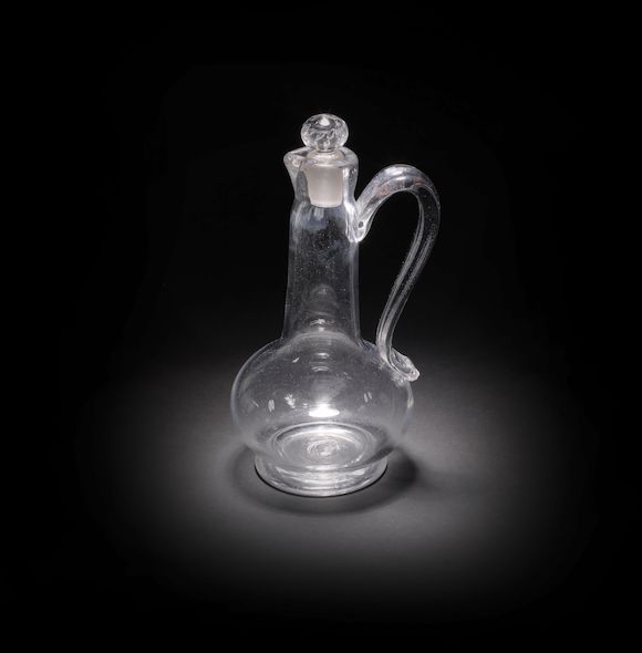 Bonhams : A shaft and globe decanter jug and stopper Circa 1720-40