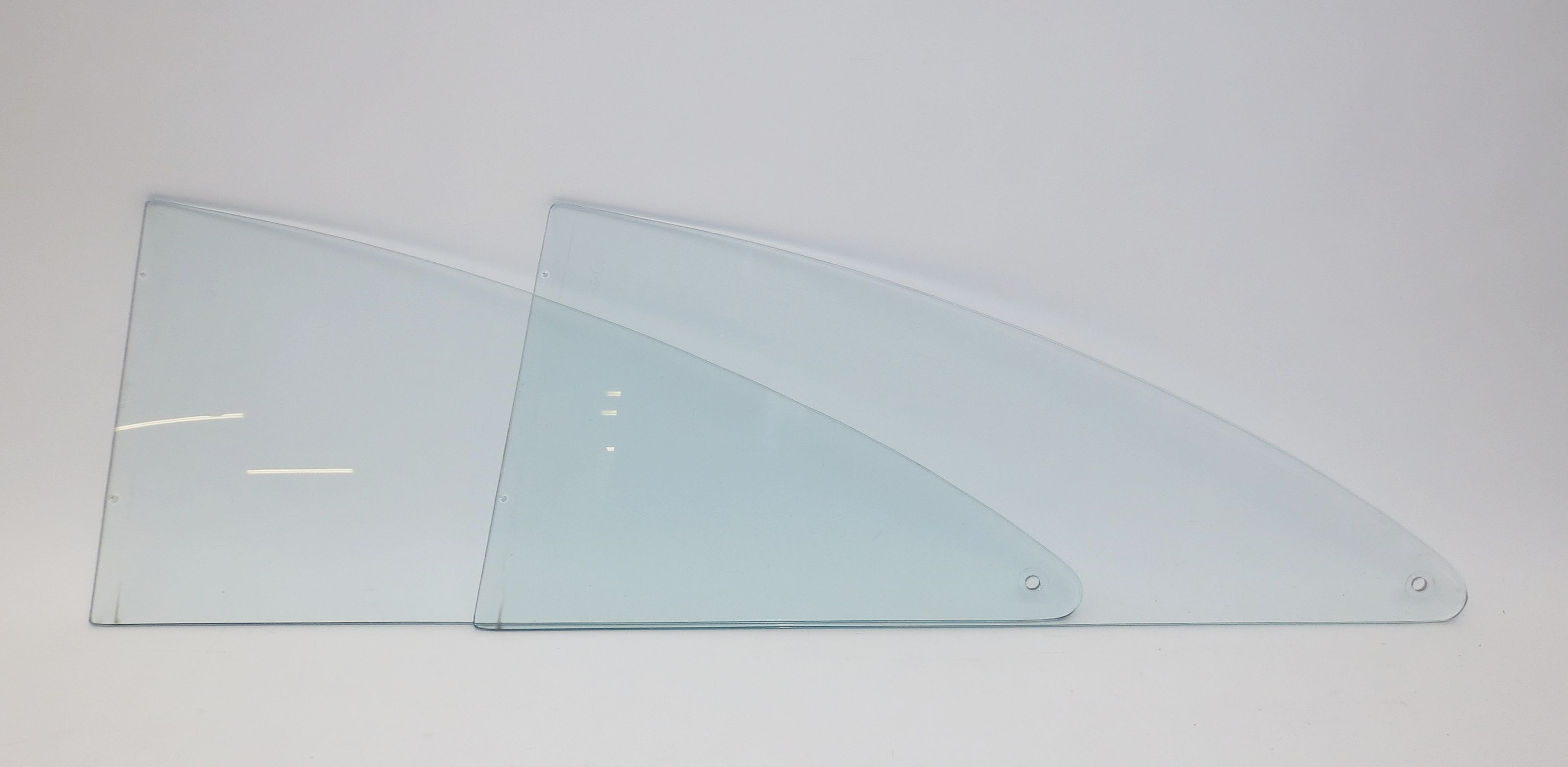 Bonhams Cars : A pair of Aston Martin DB4/5 rear quarter-light glass ...