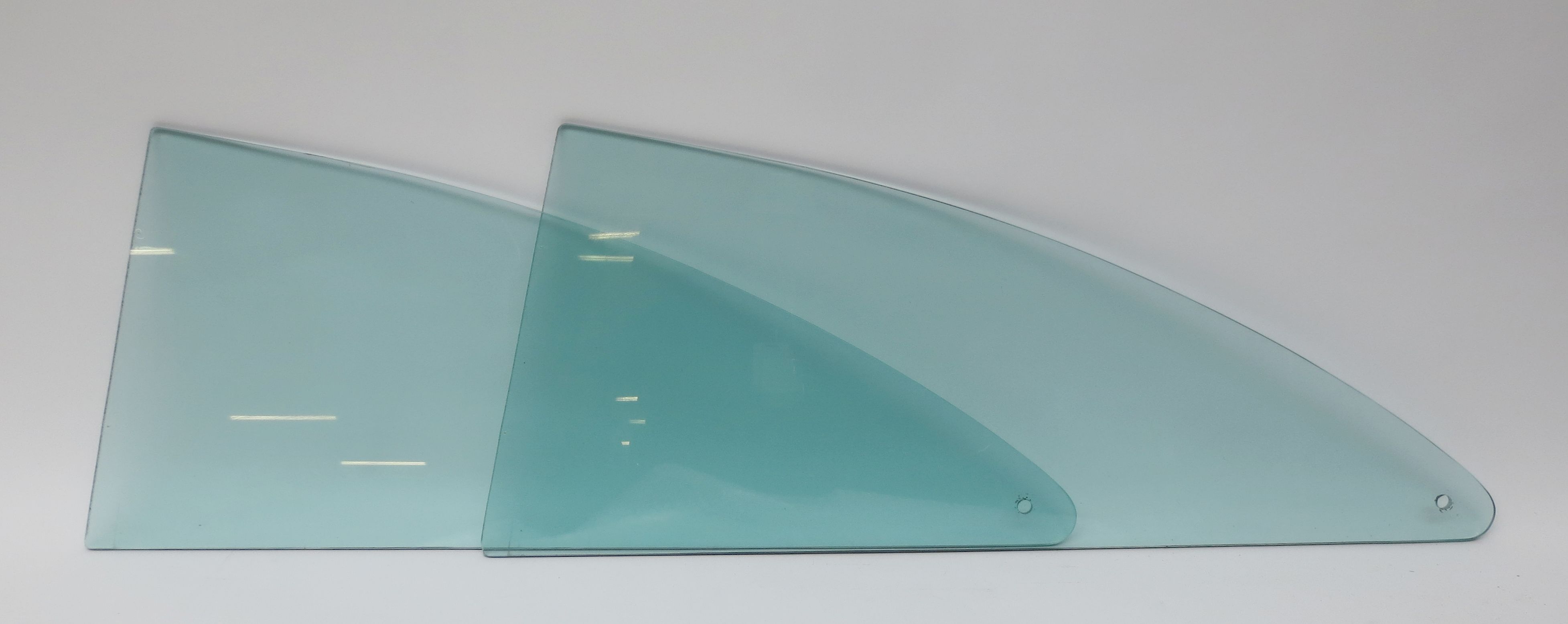 Bonhams Cars : A pair of Aston Martin DB4/5 rear quarter-light glass ...