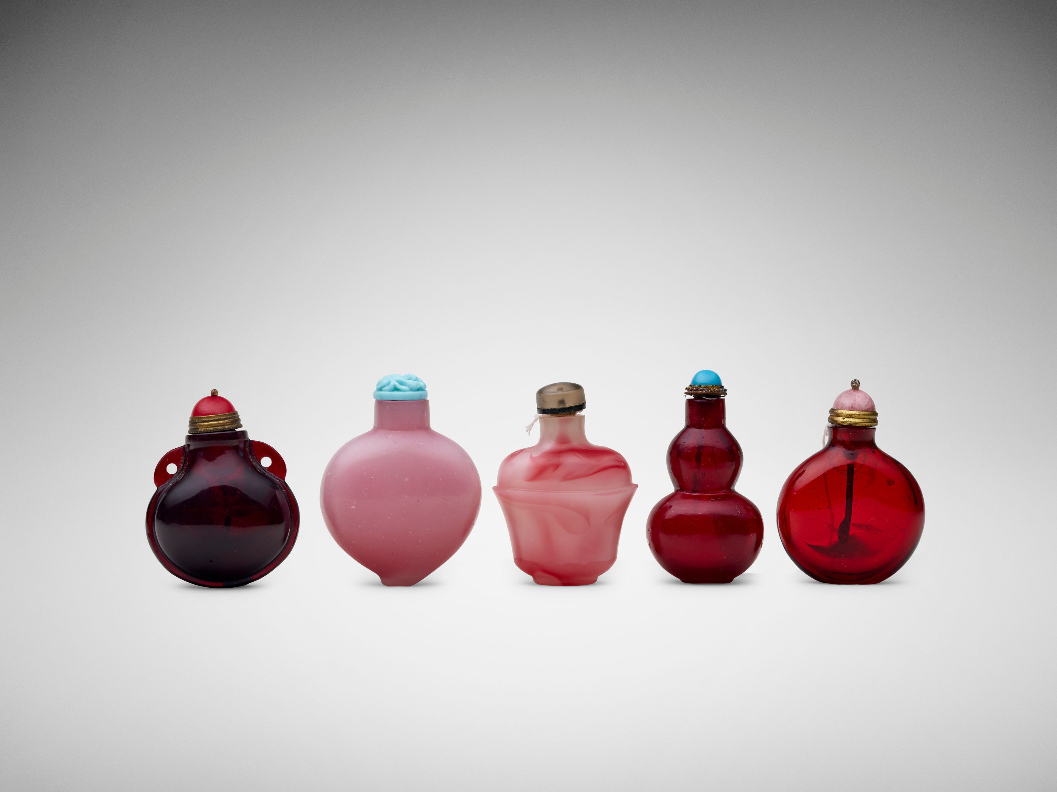 Bonhams : A group of five Chinese ruby-red and pink snuff bottles (5)
