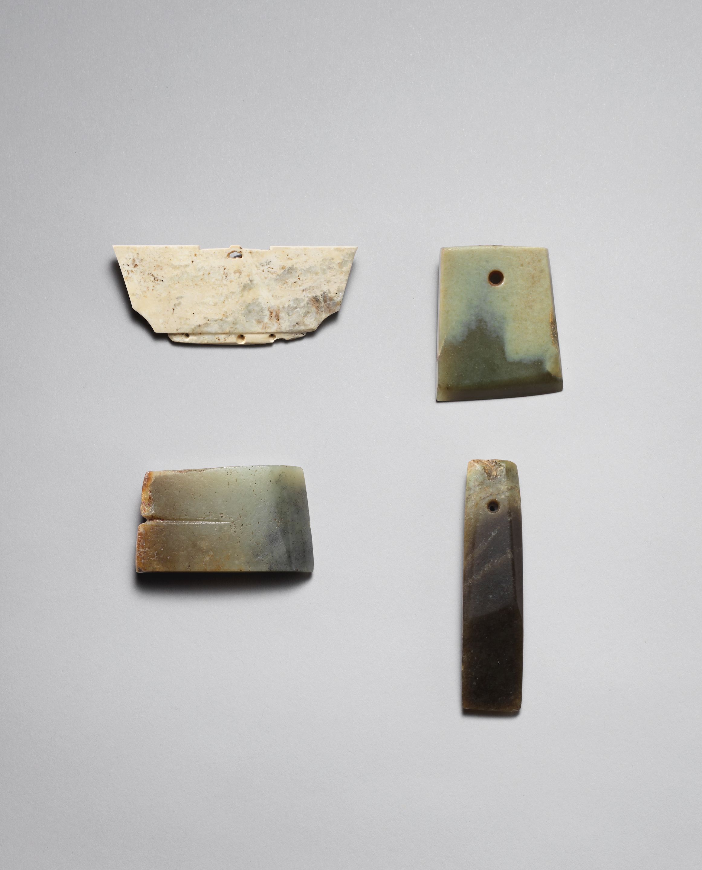 Bonhams : A jade 'crown' ornament and three jade axe-heads The ornament ...