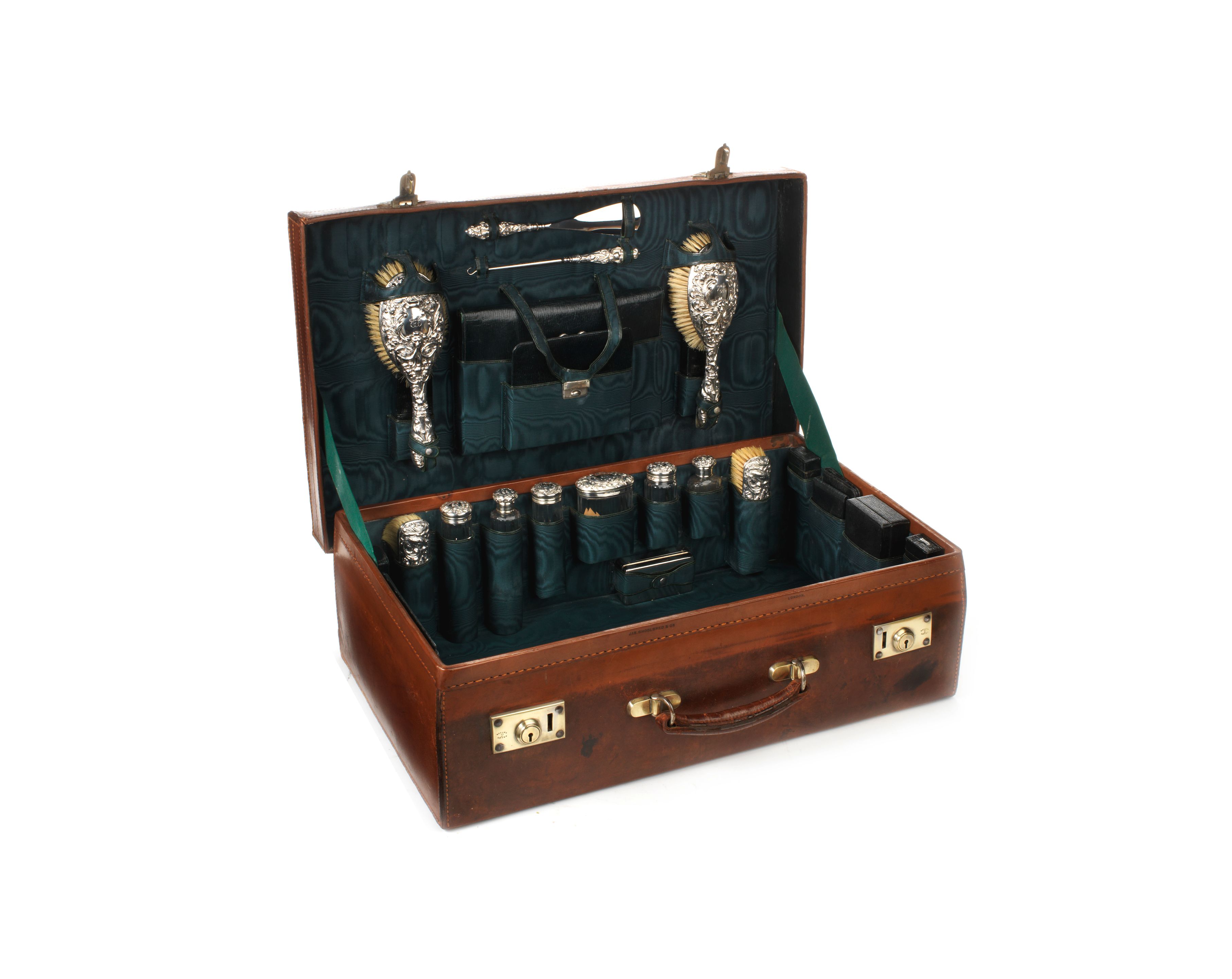 Bonhams Cars : A leather-cased vanity set with sterling silver ...